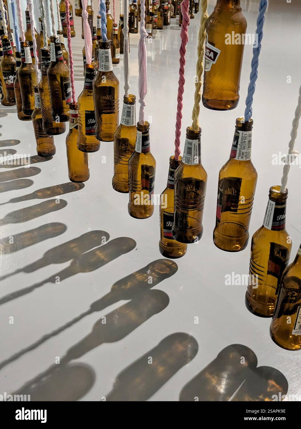 hanging empty beer bottle installation at zeitz mocaa Stock Photo - Alamy