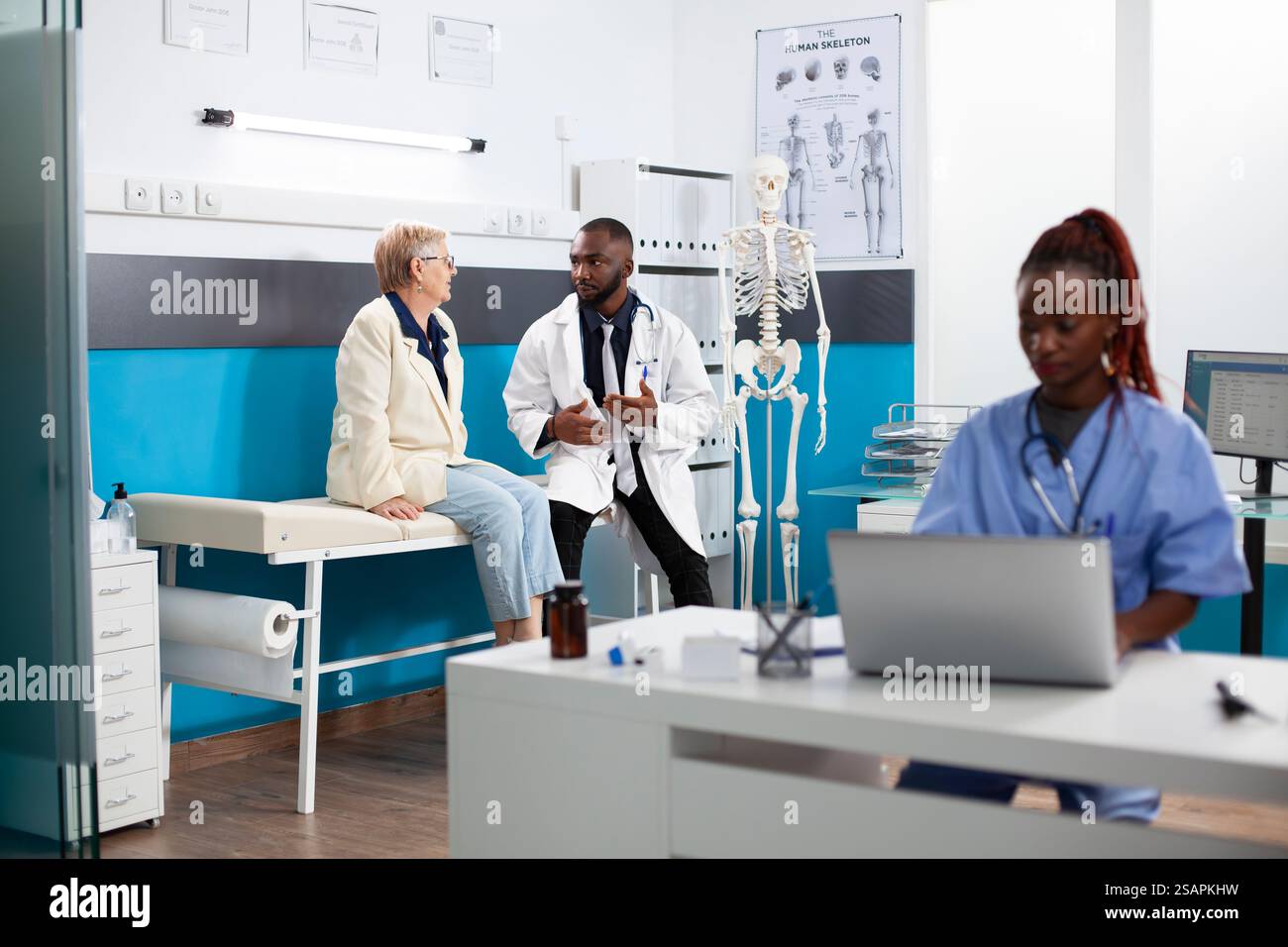Elderly woman speaking female doctor hi-res stock photography and ...