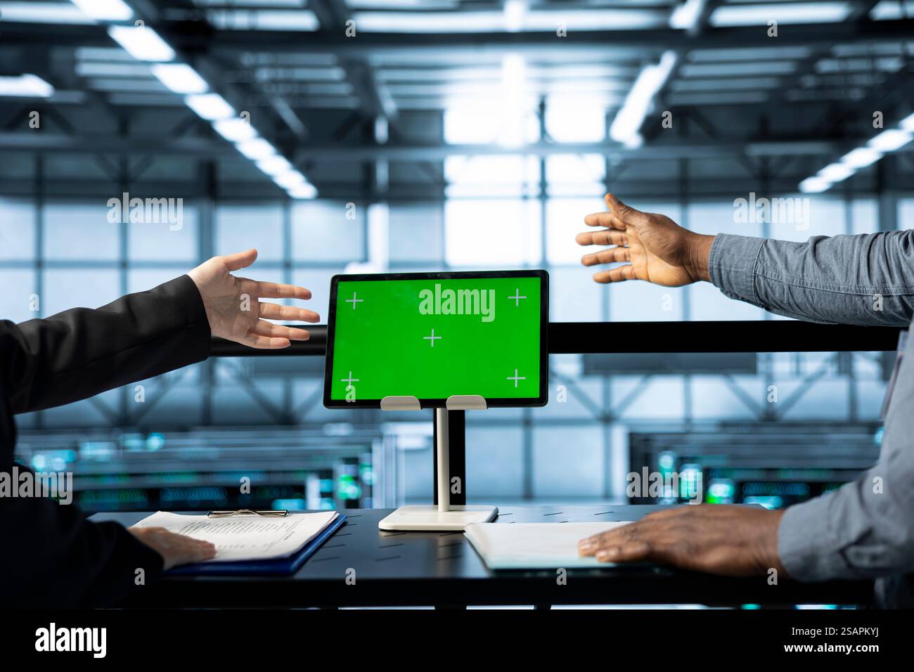 Technicians in data center using chroma key green screen tablet, refining server virtualization ...