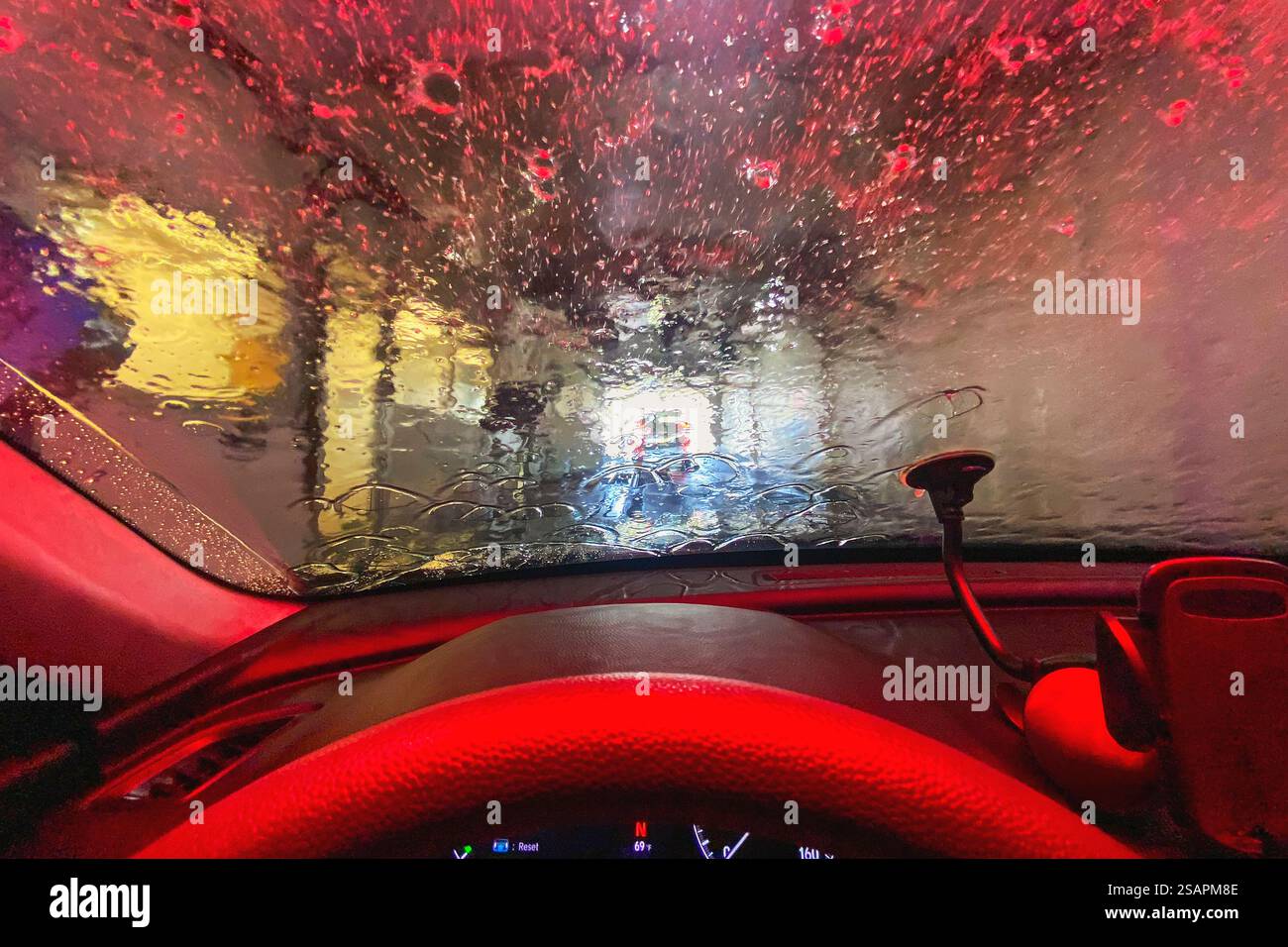 View from car interior of car being washed at car wash Stock Photo - Alamy