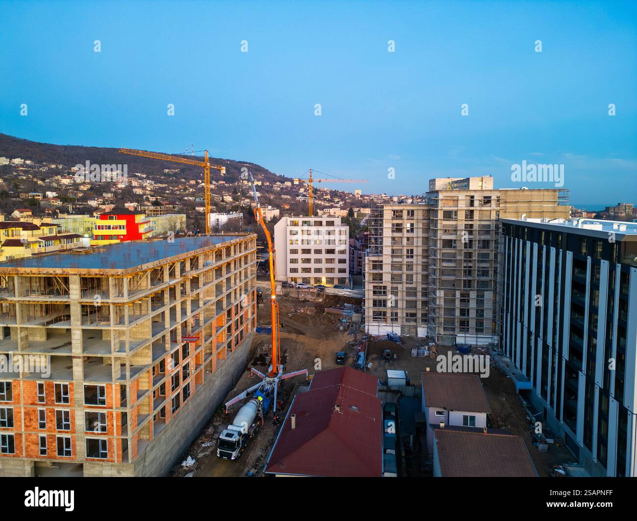 Aerial view of a construction site with a high-rise building under ...