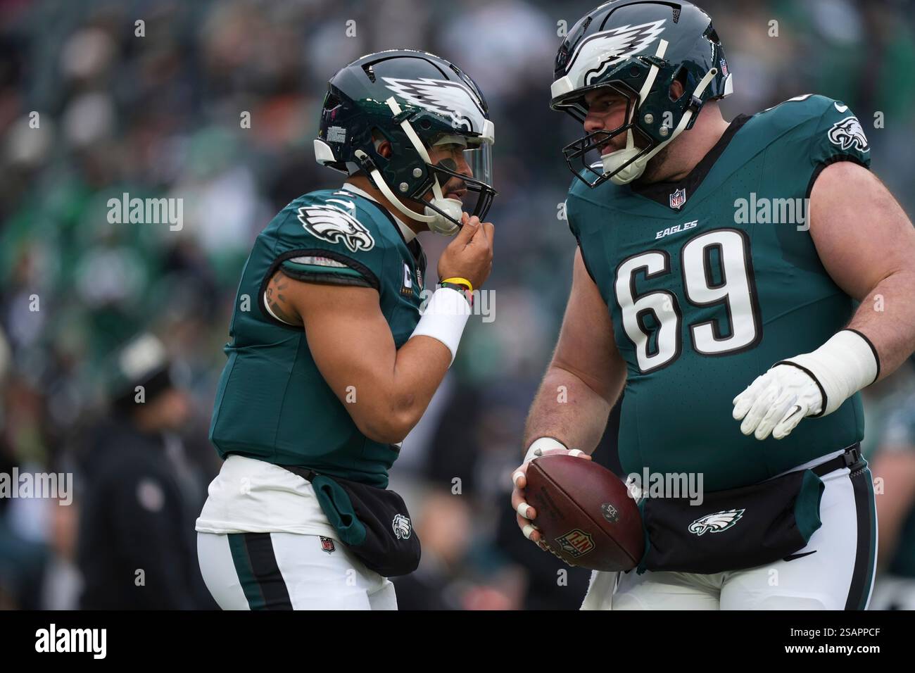 Philadelphia Eagles' Jalen Hurts and Landon Dickerson warm up before ...