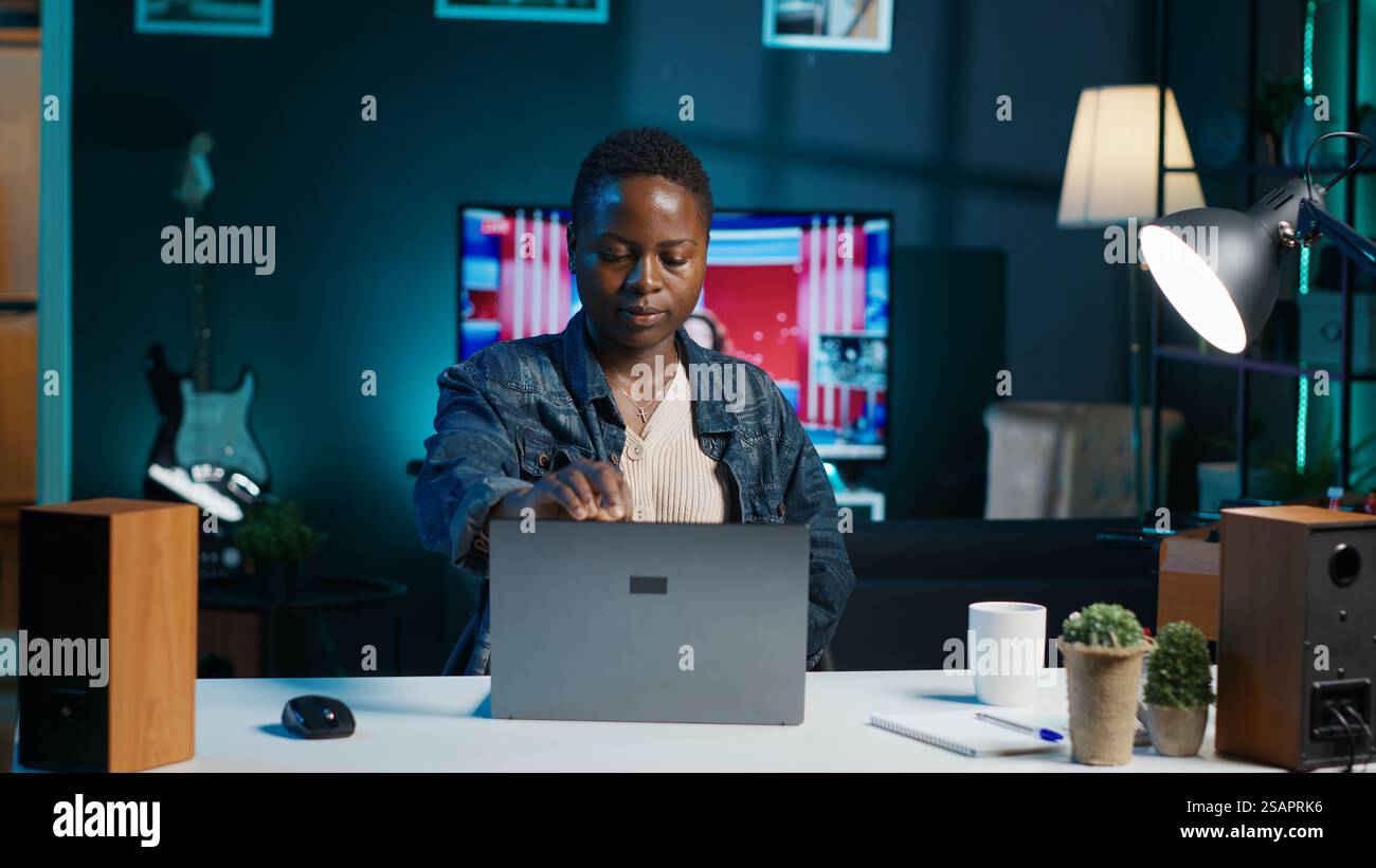 Woman opening laptop starting data hi-res stock photography and images ...