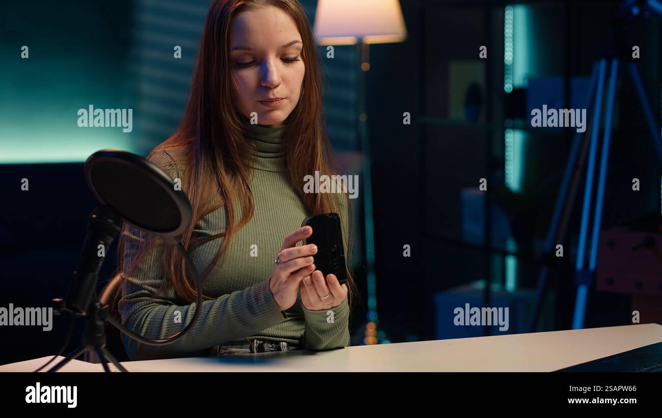 Tech expert holding V mount battery ensuring ample power to fuel ...