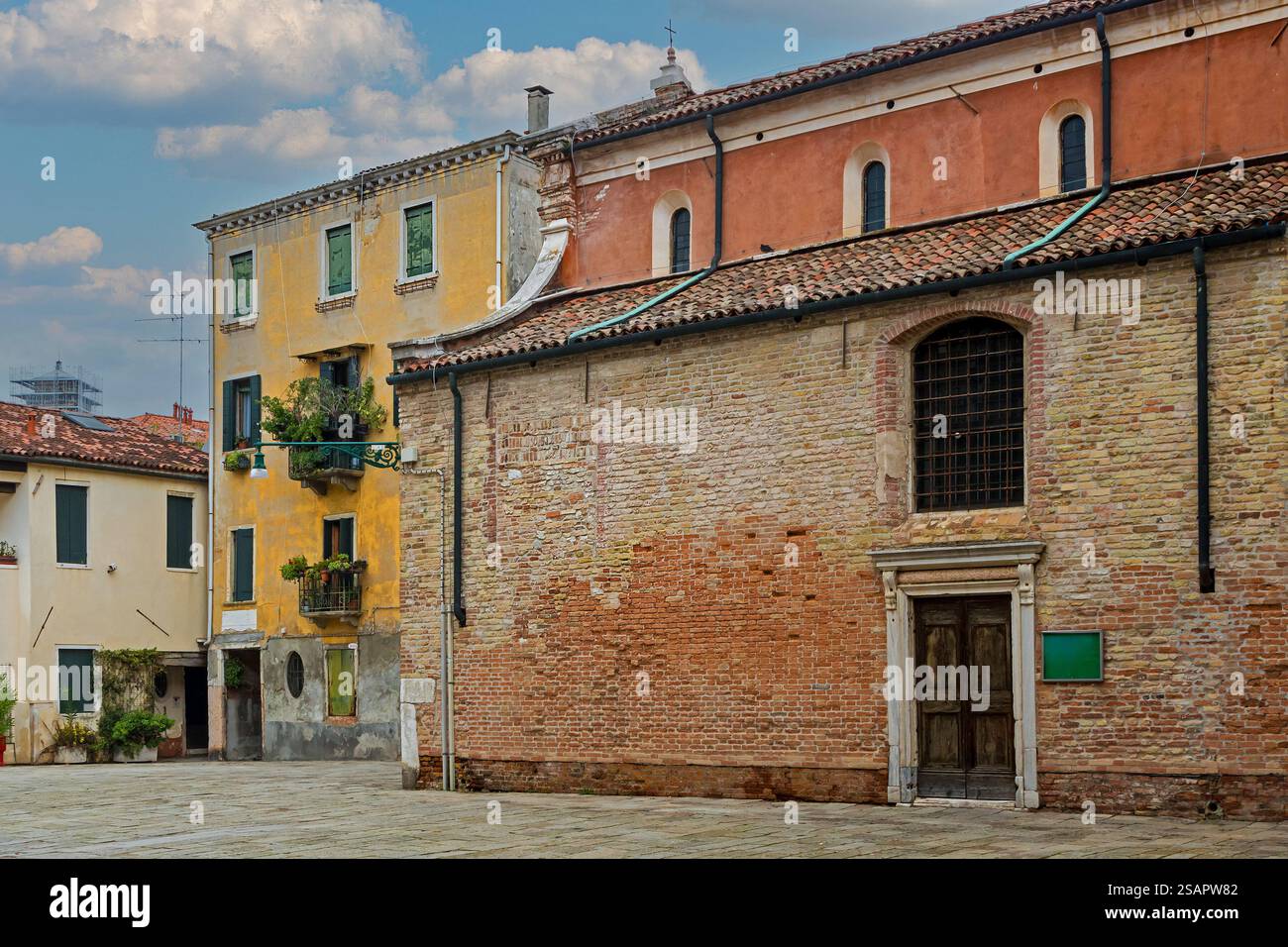 Old ancient Italian house building with brick wall facade in city of ...