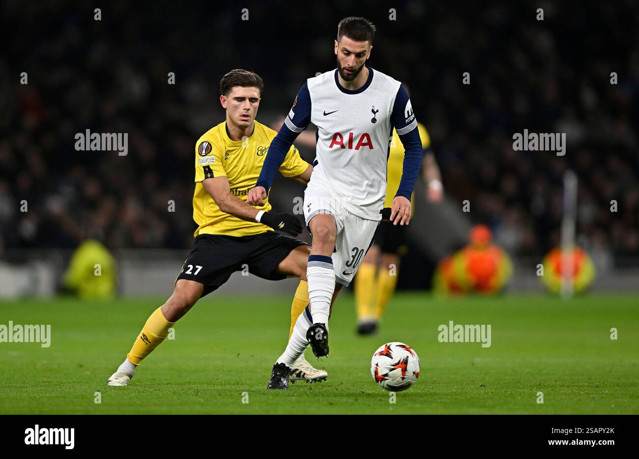 London, UK. 30th Jan, 2025. Rodrigo Bentancur (Spurs) and Besfort ...