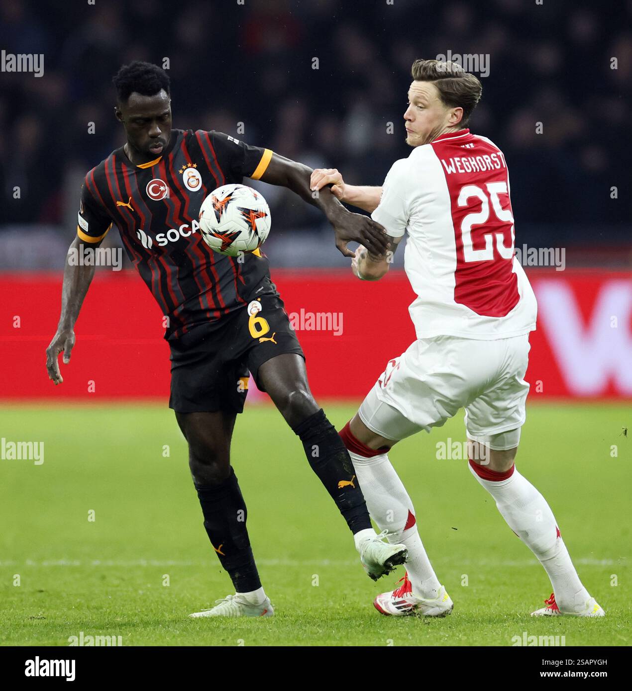 AMSTERDAM - (l-r) Davinson Sanchez of Galatasaray SK, Wout Weghorst of ...