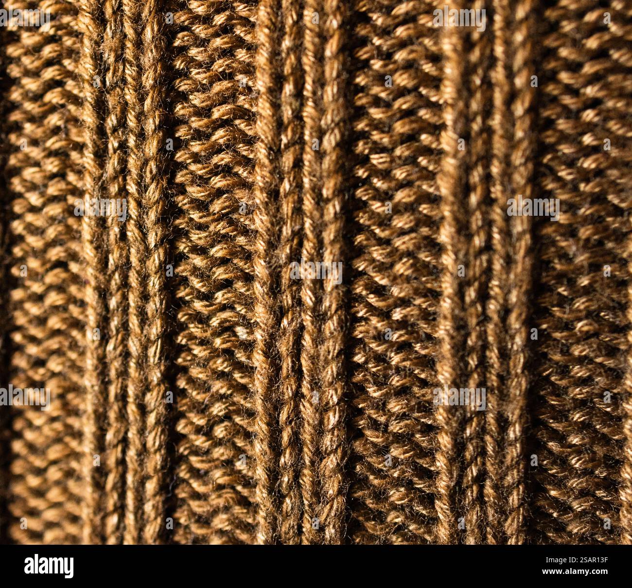 Texture of Mocha-coloured knitted fabric .Close-up shot, hand-knitted ...