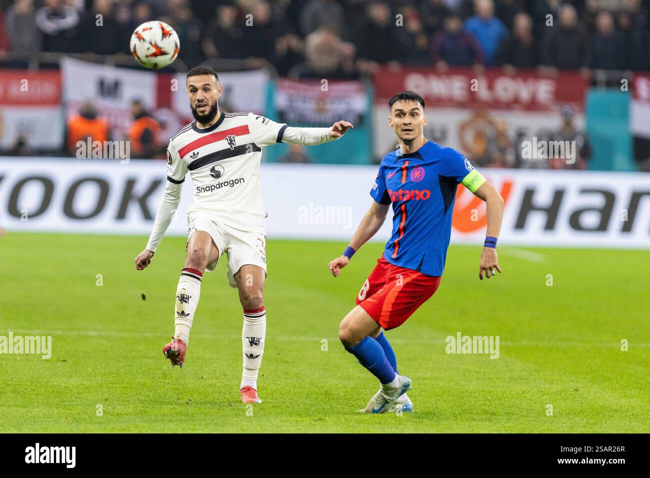 Noussair Mazraoui of Manchester United and Adrian Sut of FCSB in action ...