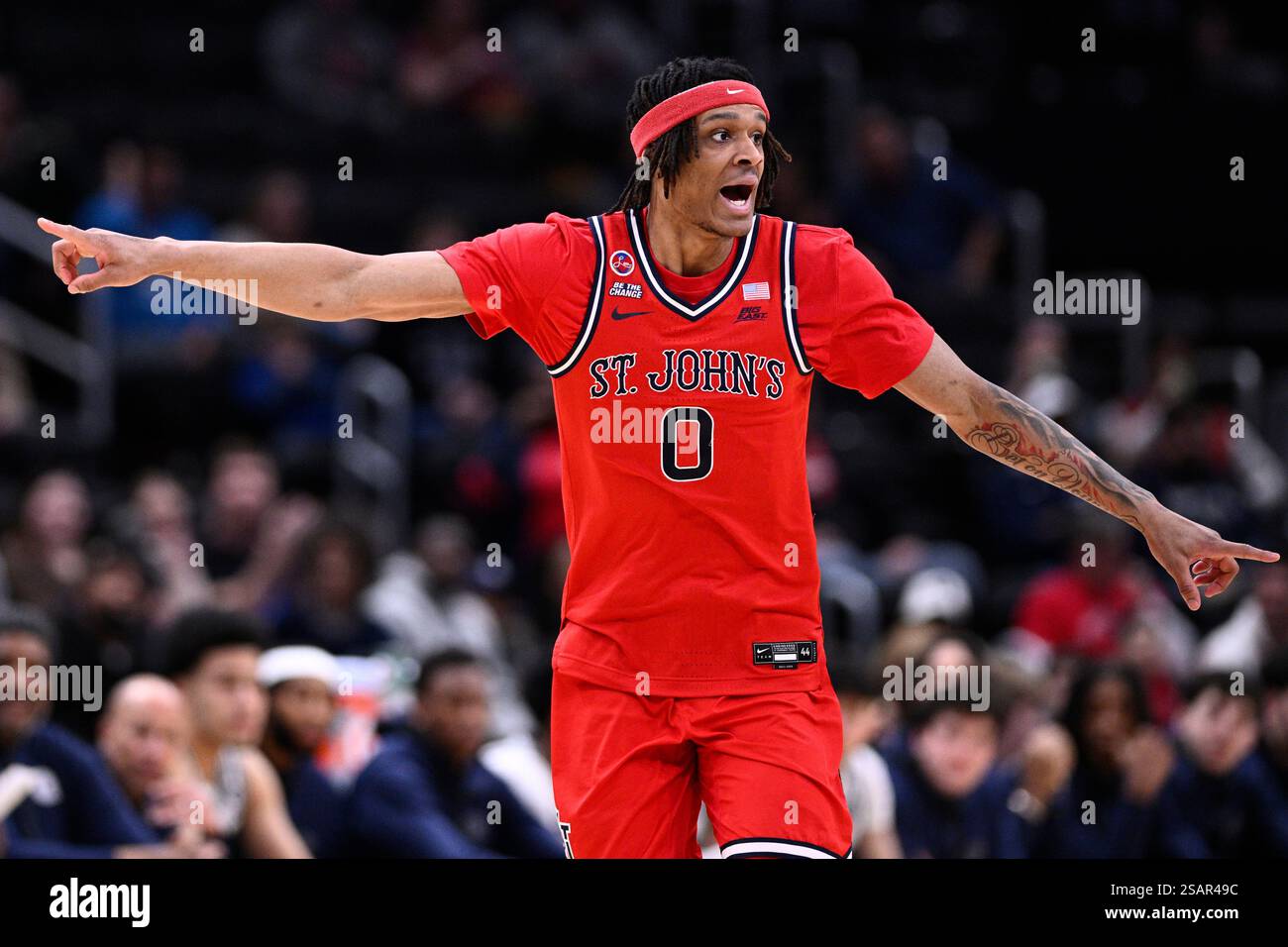 St. John's guard Aaron Scott (0) in action during the first half of an ...