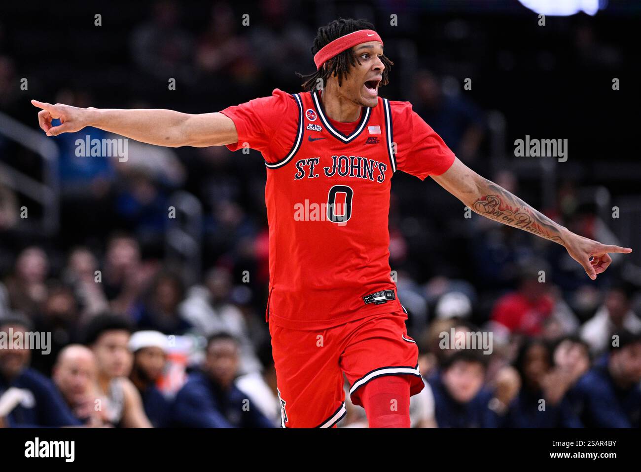 St. John's guard Aaron Scott (0) in action during the first half of an ...