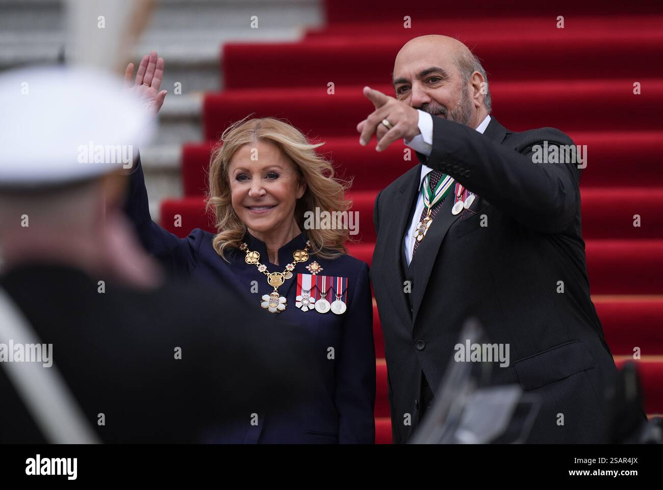 Victoria, Canada. 30th Jan, 2025. B.C. Lt-Gov. Wendy Cocchia waves to a ...