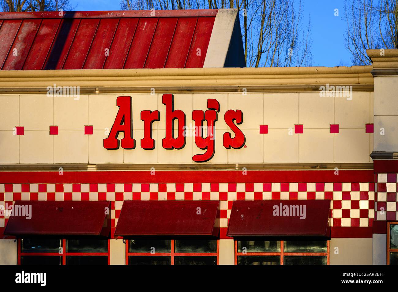 Bothell, WA, USA - January 26, 2025; Arby's logo sign on business a ...