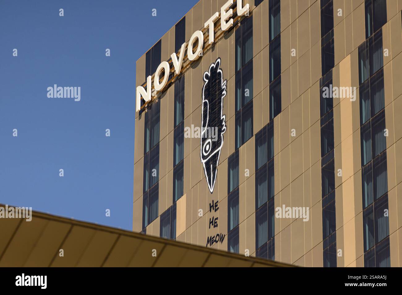 A cartoon-like image of "Pam the Bird" is seen on the facade of the ...