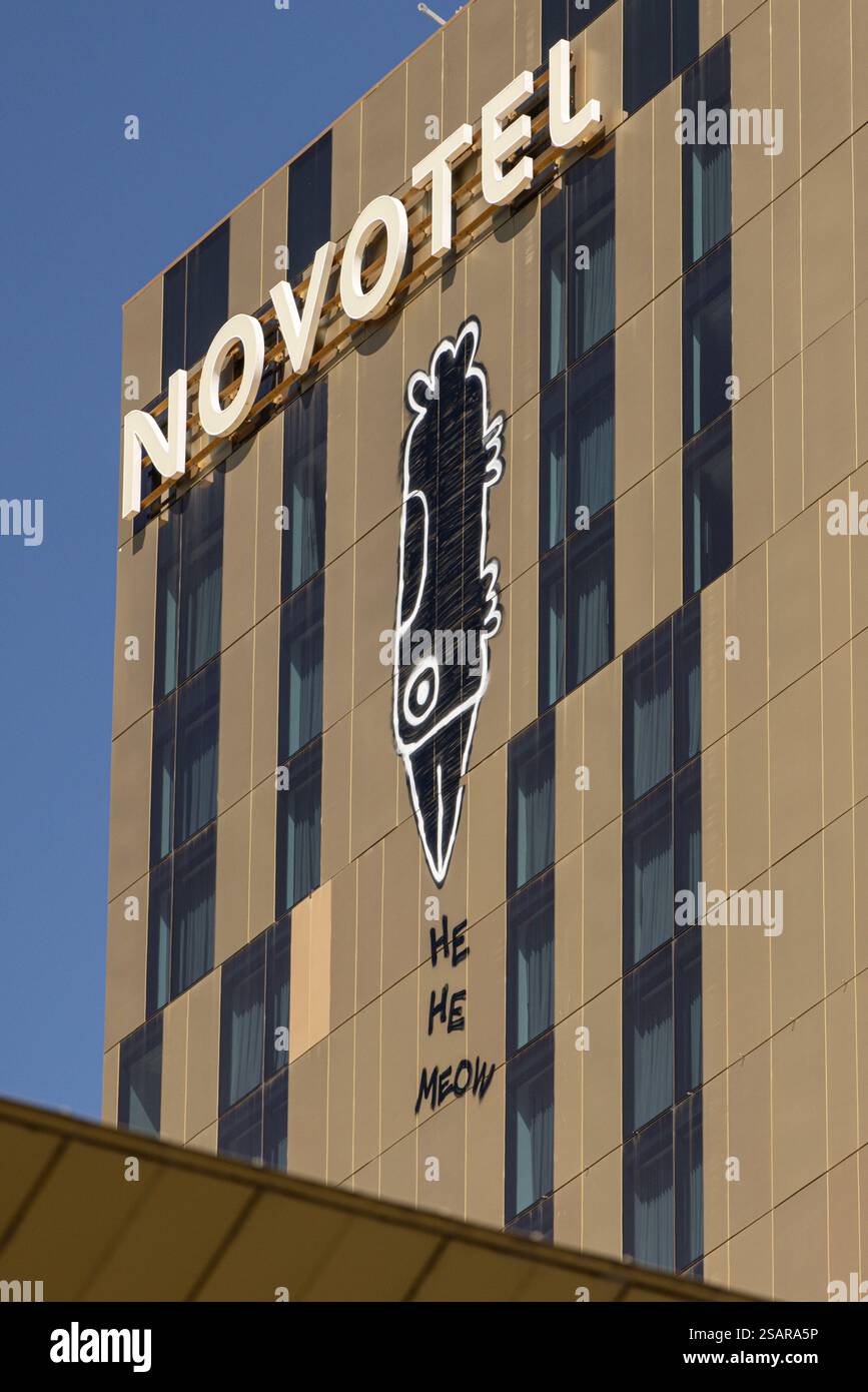 A cartoon-like image of "Pam the Bird" is seen on the facade of the ...
