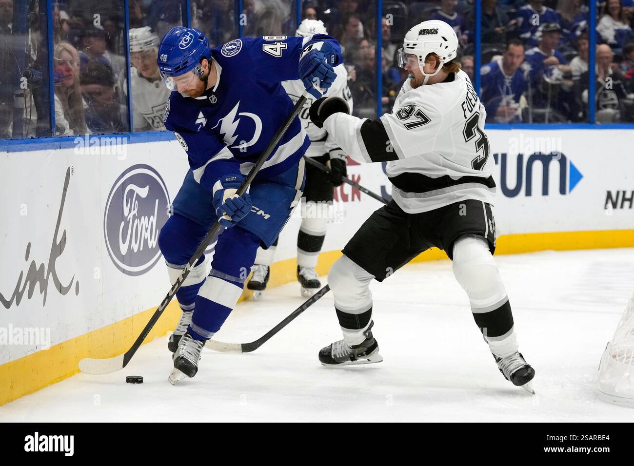 Tampa Bay Lightning defenseman Nick Perbix (48) carries the puck past ...