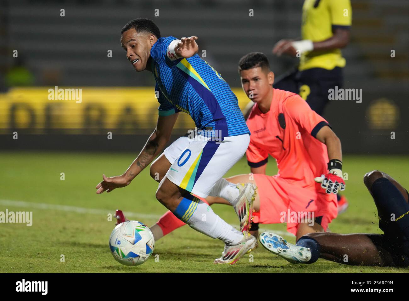 Brazil's Pedro Silva evades Ecuador's goalkeeper Cristhian Loor during ...