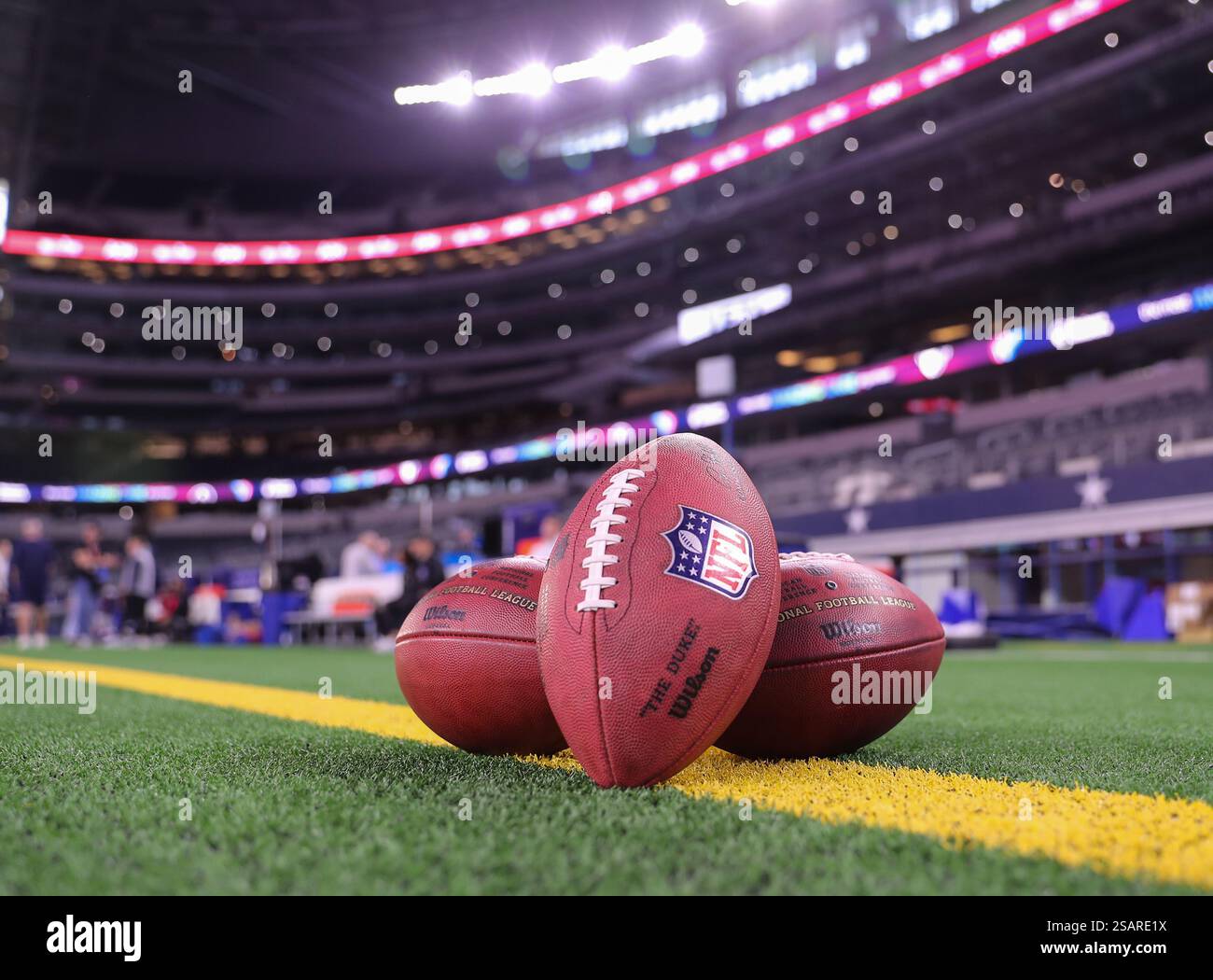 Arlington, Texas, USA. 30th Jan, 2025. NFL footballs sit on the turf of ...