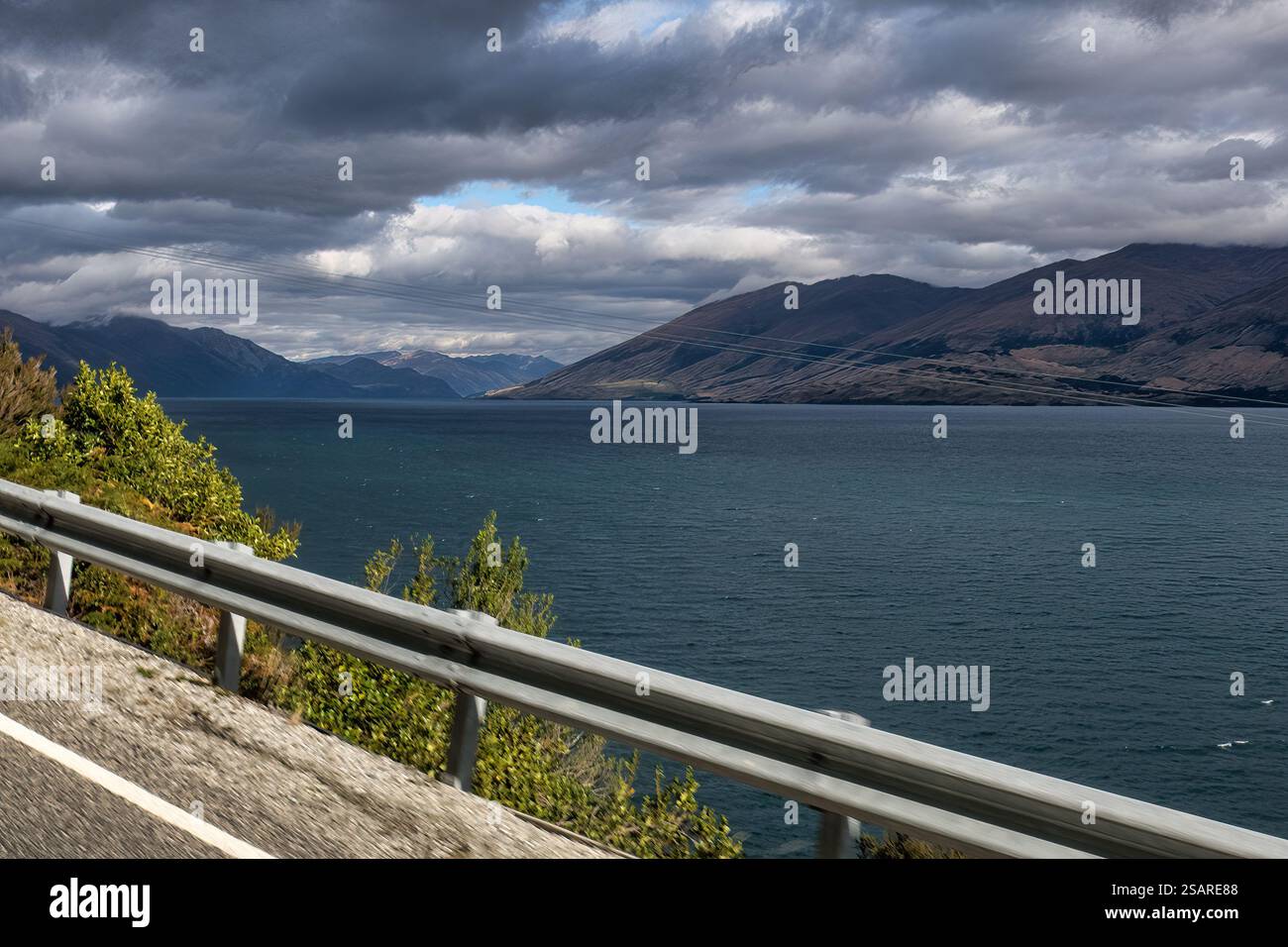 The mountains along both sides of Lake Hawea near Wanaka Stock Photo ...
