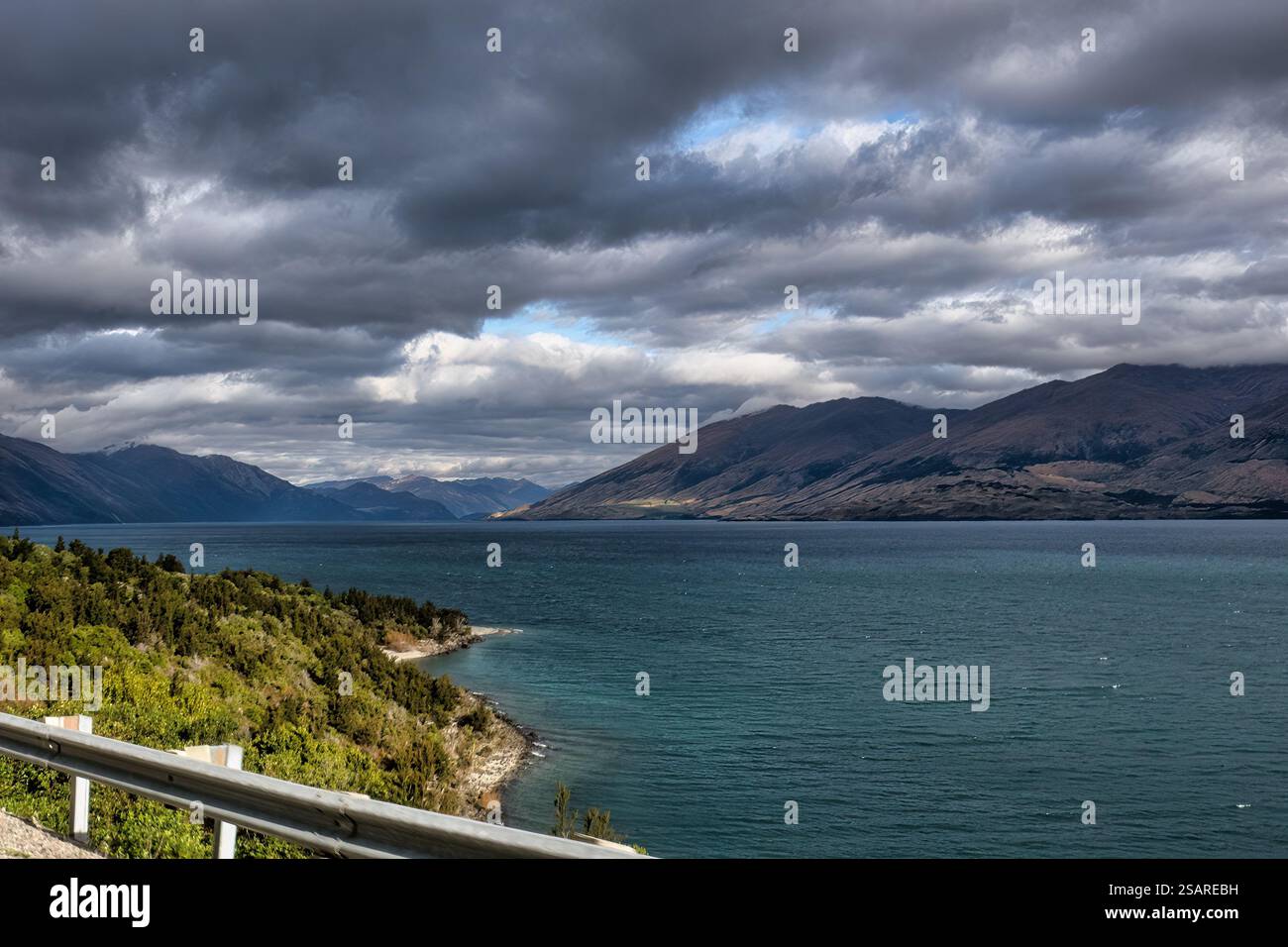 The mountains along both sides of Lake Hawea near Wanaka Stock Photo ...