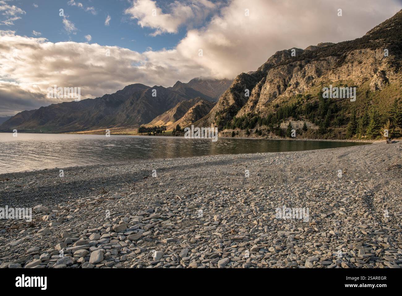The mountains along both sides of Lake Hawea near Wanaka Stock Photo ...