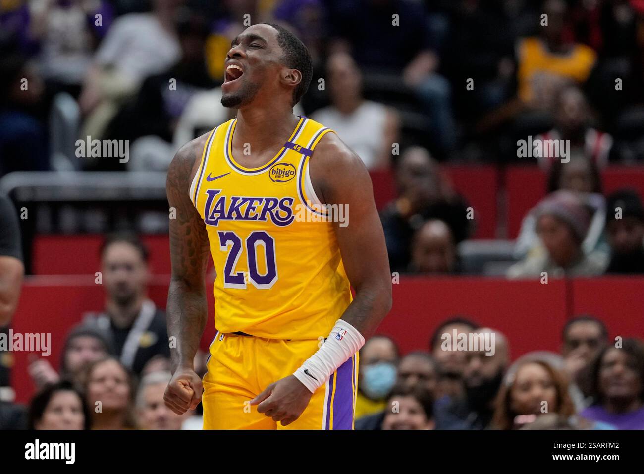 Los Angeles Lakers guard Shake Milton (20) reacts after scoring against ...