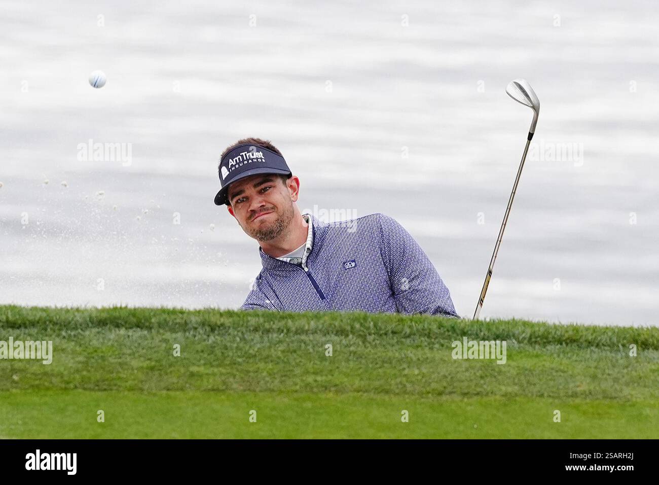PEBBLE BEACH, CA - JANUARY 30: PGA golfer Beau Hossler hits a sand shot ...