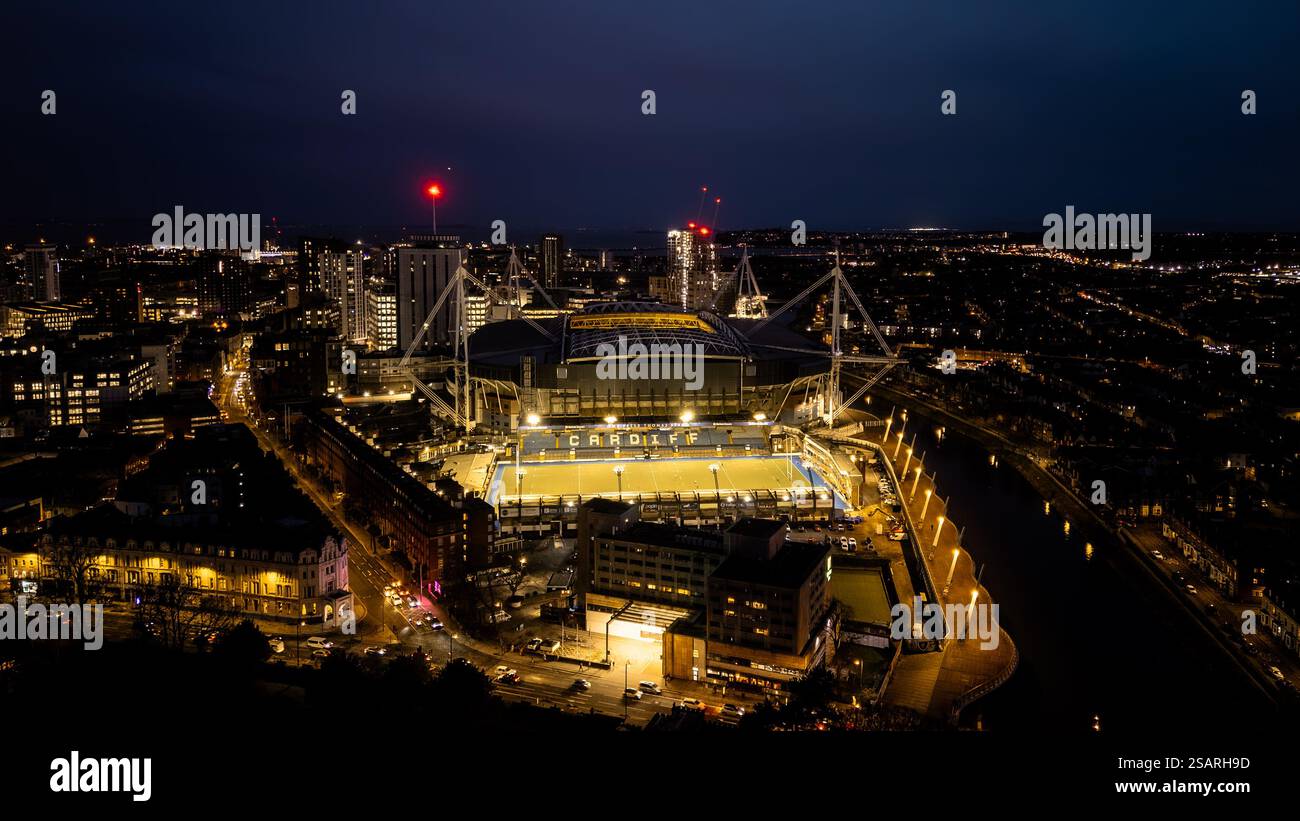 Aerial view of Cardiff city center at night, illuminating the stadium ...