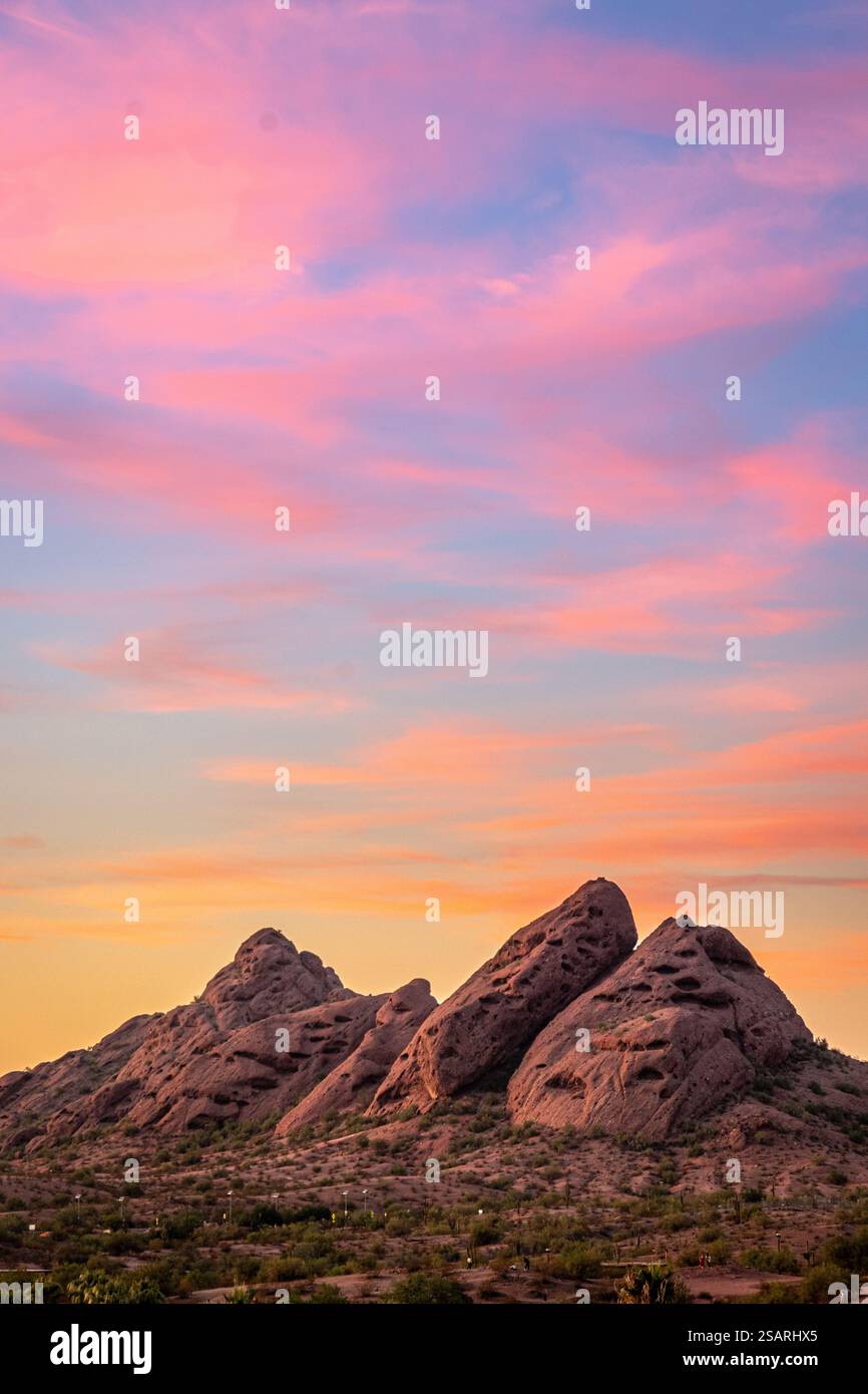 A vibrant magenta sunset with colorful clouds illuminating the iconic ...