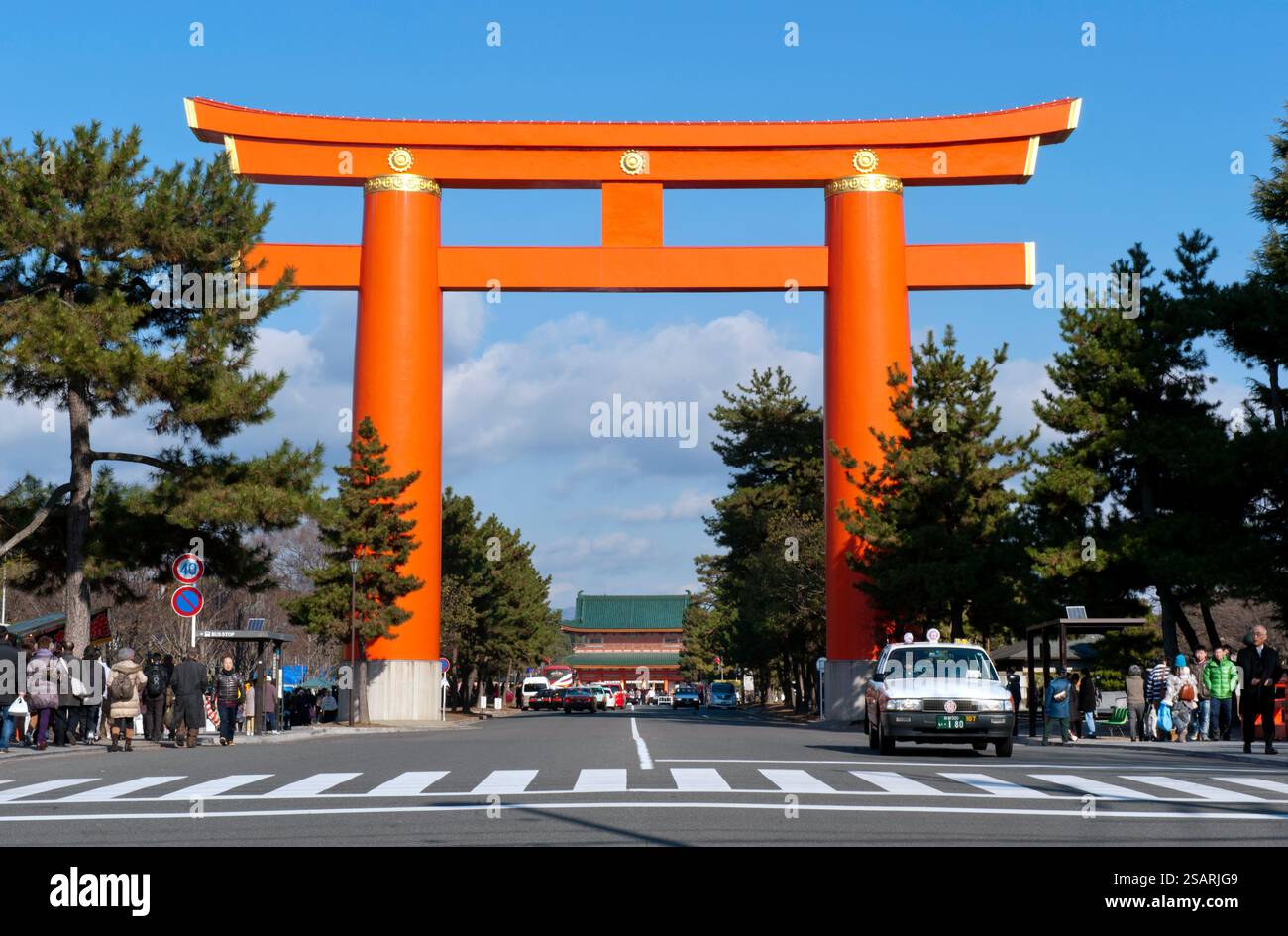 A giant vermilion torii (shrine gate) marks the entrance to Heian Jingu ...