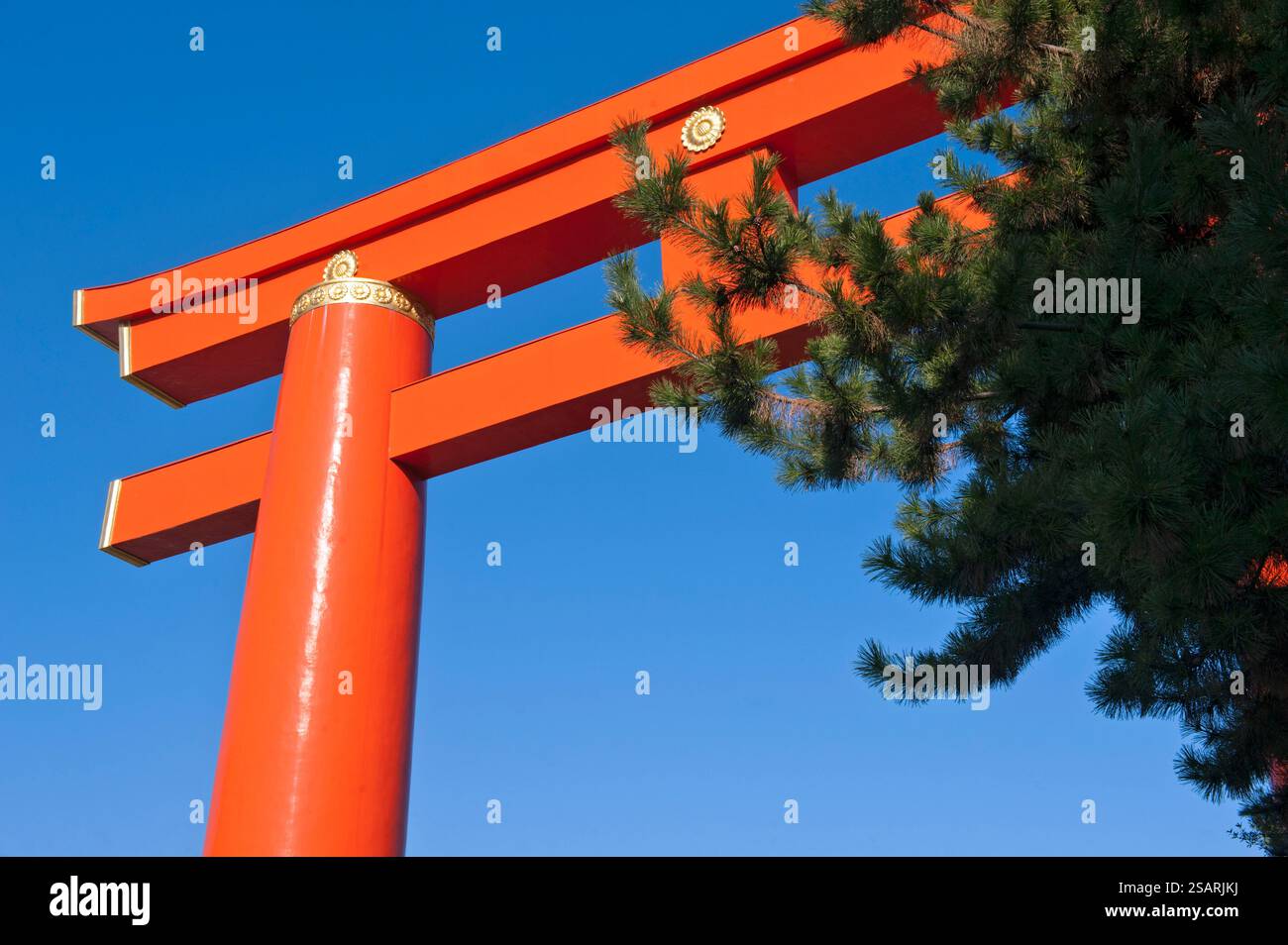 A giant vermilion torii (shrine gate) marks the entrance to Heian Jingu ...