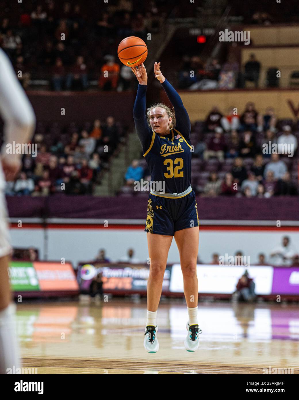 Notre Dame's Liza Karlen (32) hits a 3 pointer against Virginia Tech ...