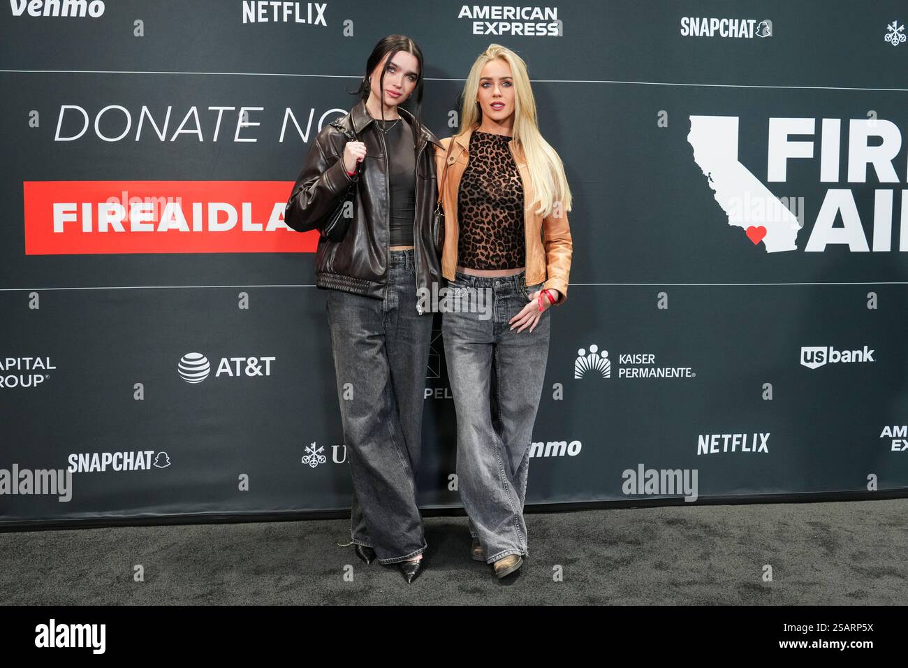 Brooke Blewitt, left, and Jess Qualter arrive at the FireAid benefit ...