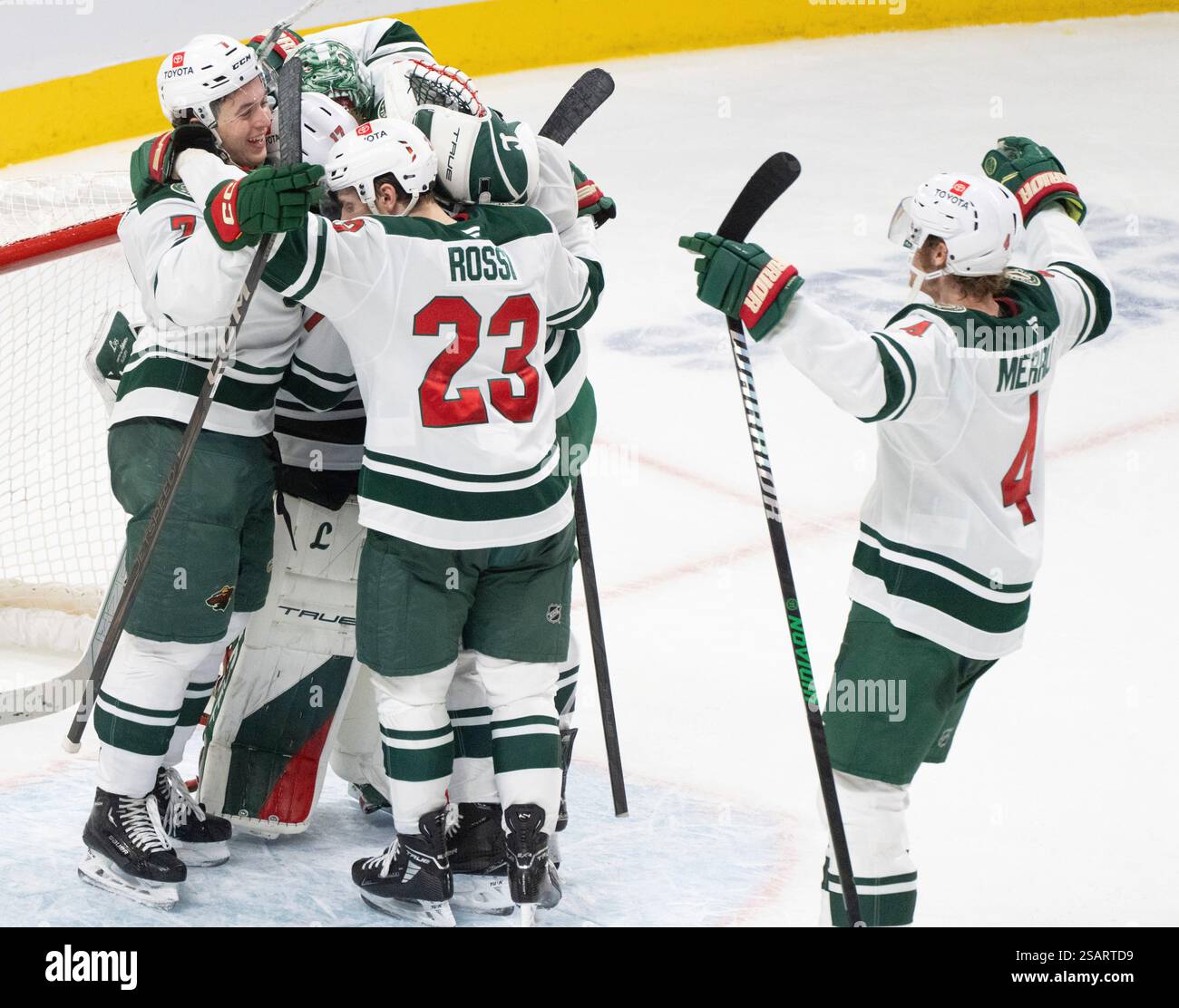 Minnesota Wild goaltender Marc-Andre Fleury surrounded by teammates ...