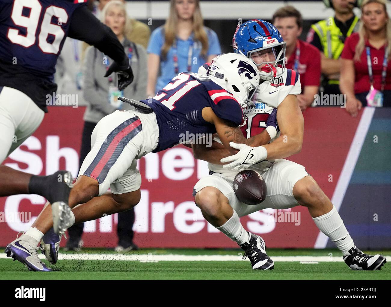 West's Caden Prieskorn, right, of Ole Miss, fumbles the ball after ...