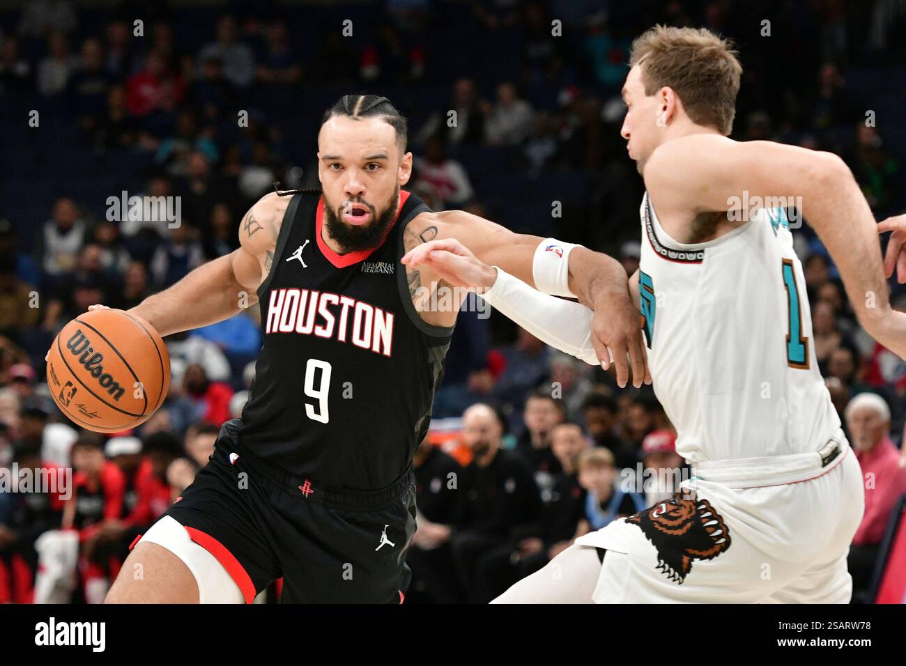 Houston Rockets forward Dillon Brooks (9) handles the ball against ...