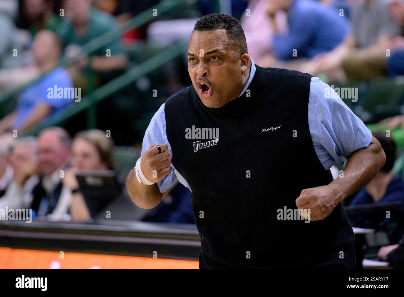 Tulane head coach Ron Hunter reacts during the first half of an NCAA ...