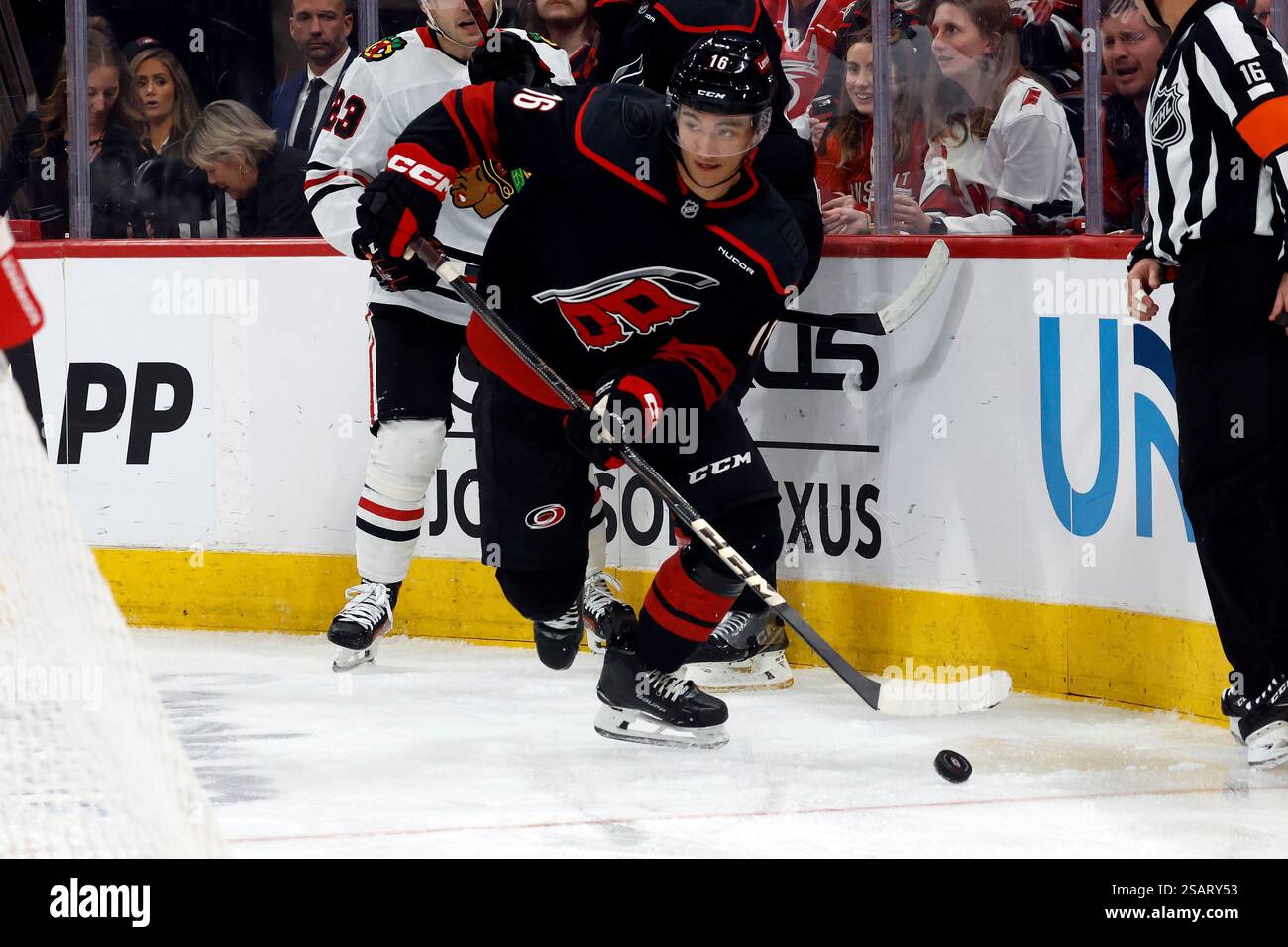 Carolina Hurricanes Ryan Suzuki (16) moves the puck against the Chicago ...