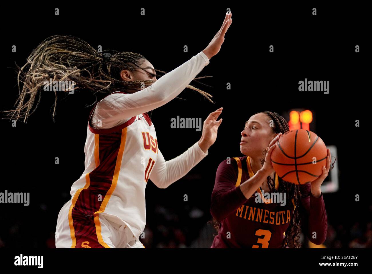 Minnesota guard Amaya Battle (3) goes to the basket against Southern ...
