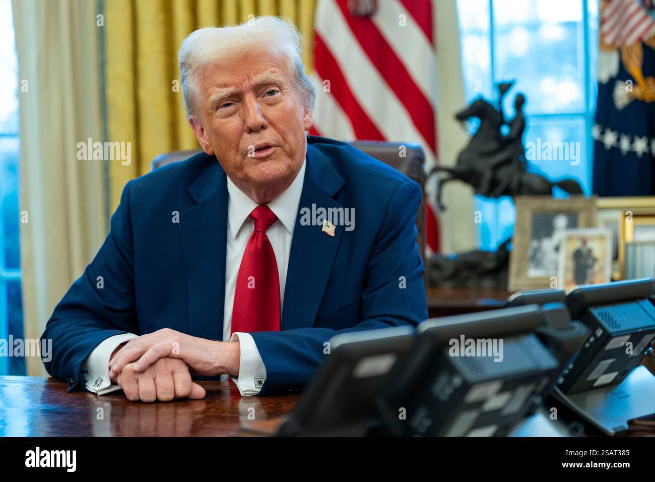 United States President Donald Trump signs two executive orders in the ...
