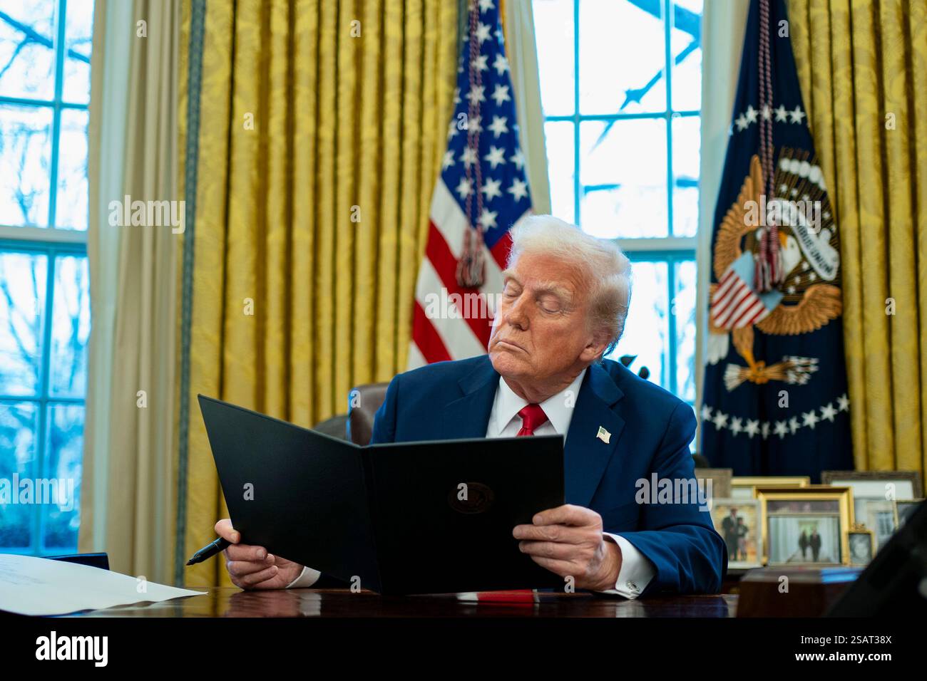 United States President Donald Trump signs two executive orders in the ...