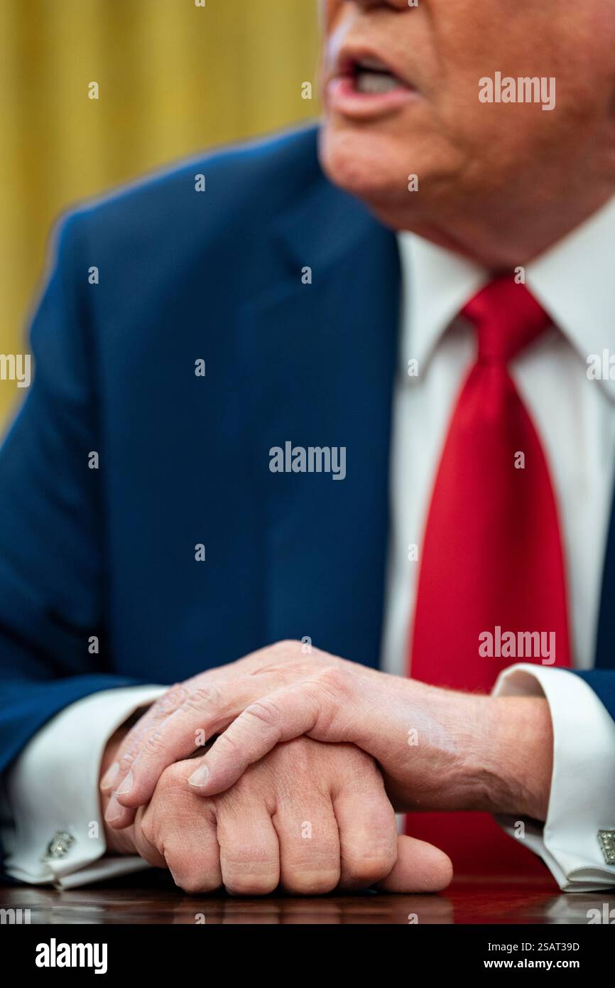 United States President Donald Trump signs two executive orders in the ...