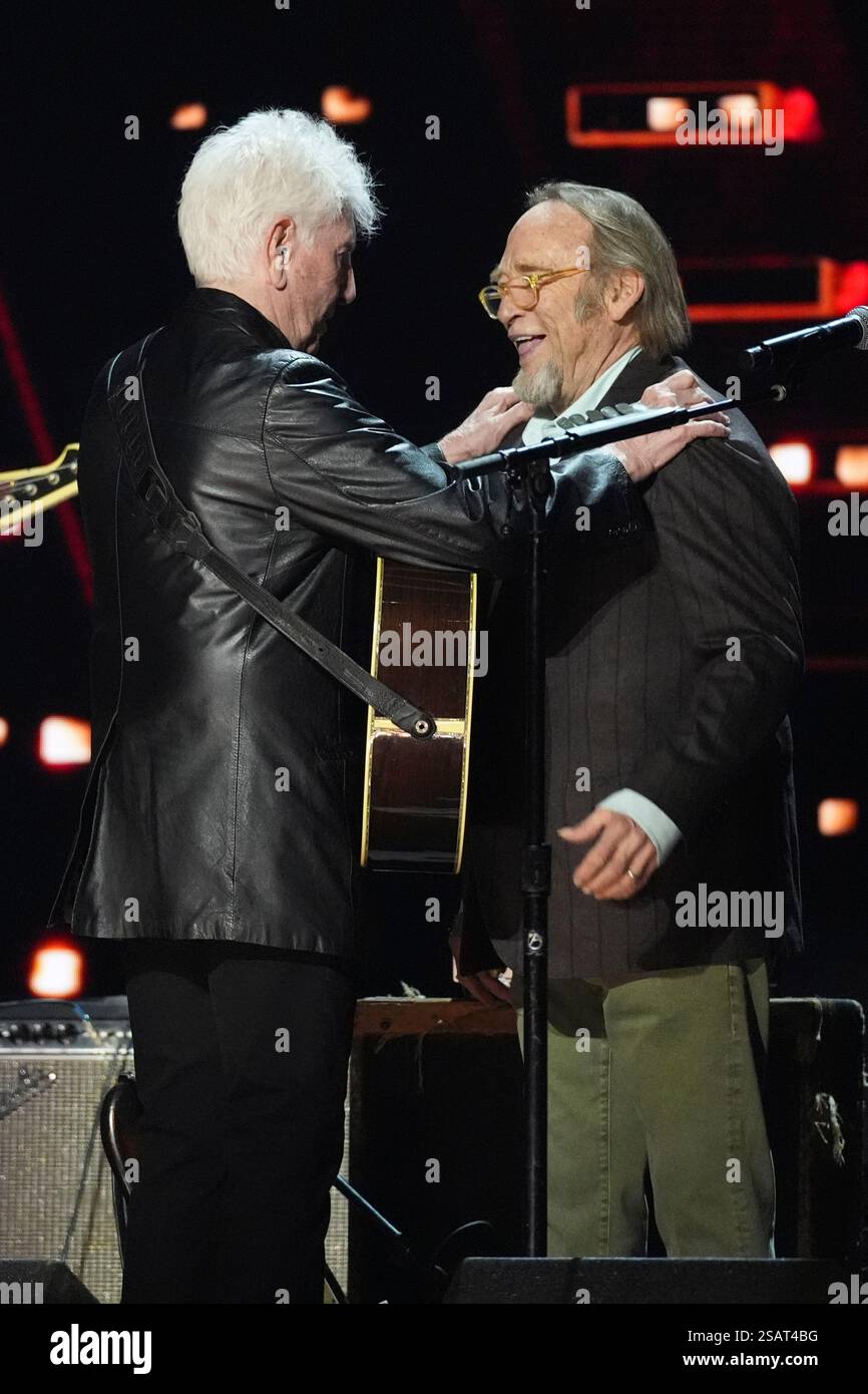 Graham Nash, left, and Stephen Stills perform during the FireAid ...