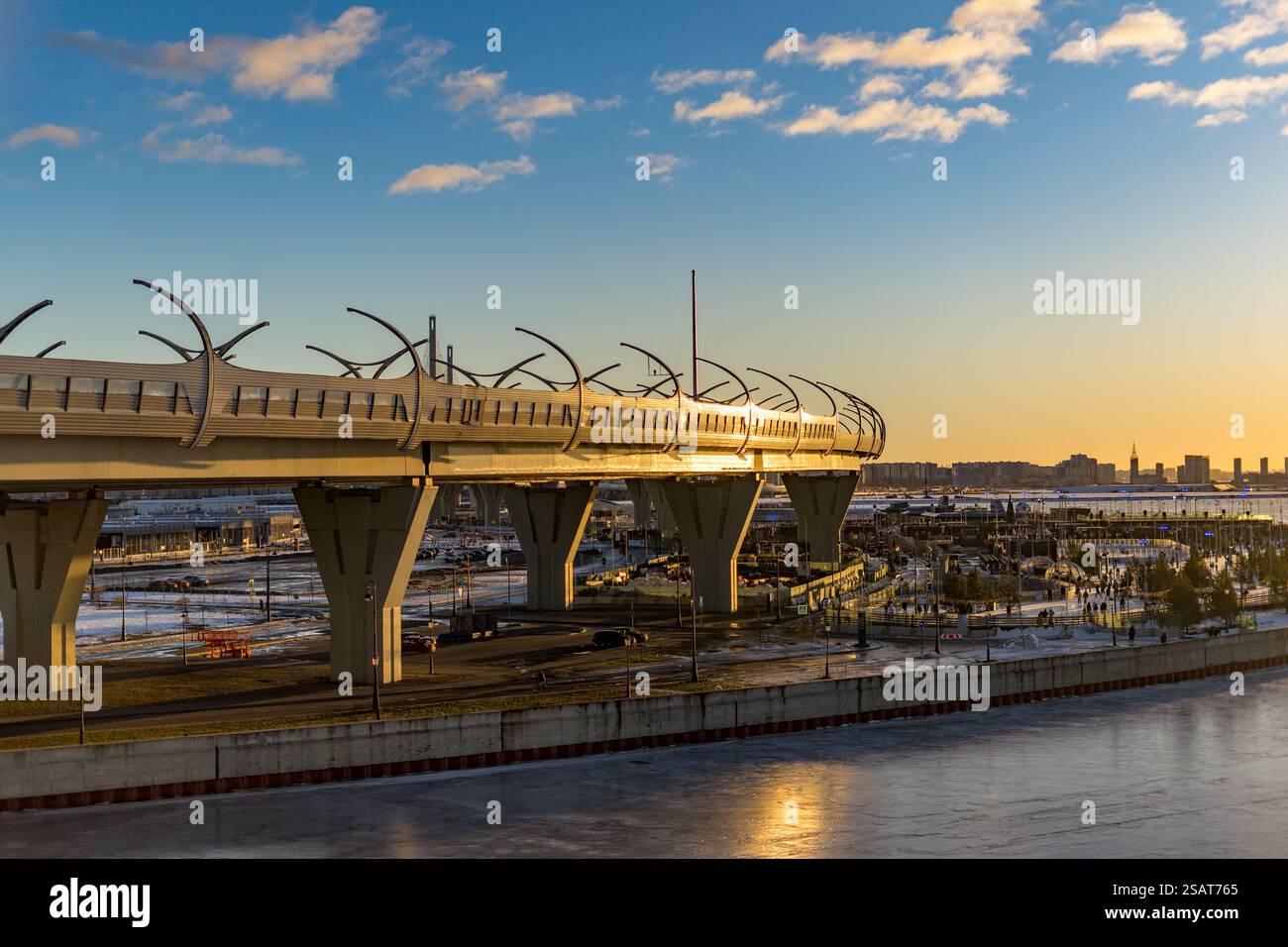 High-speed road bridge in the city at sunset Stock Photo - Alamy