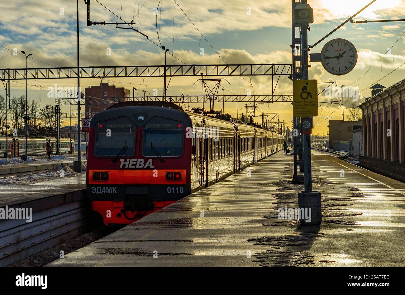 Suburban electric train standing on a railway platform Stock Photo - Alamy