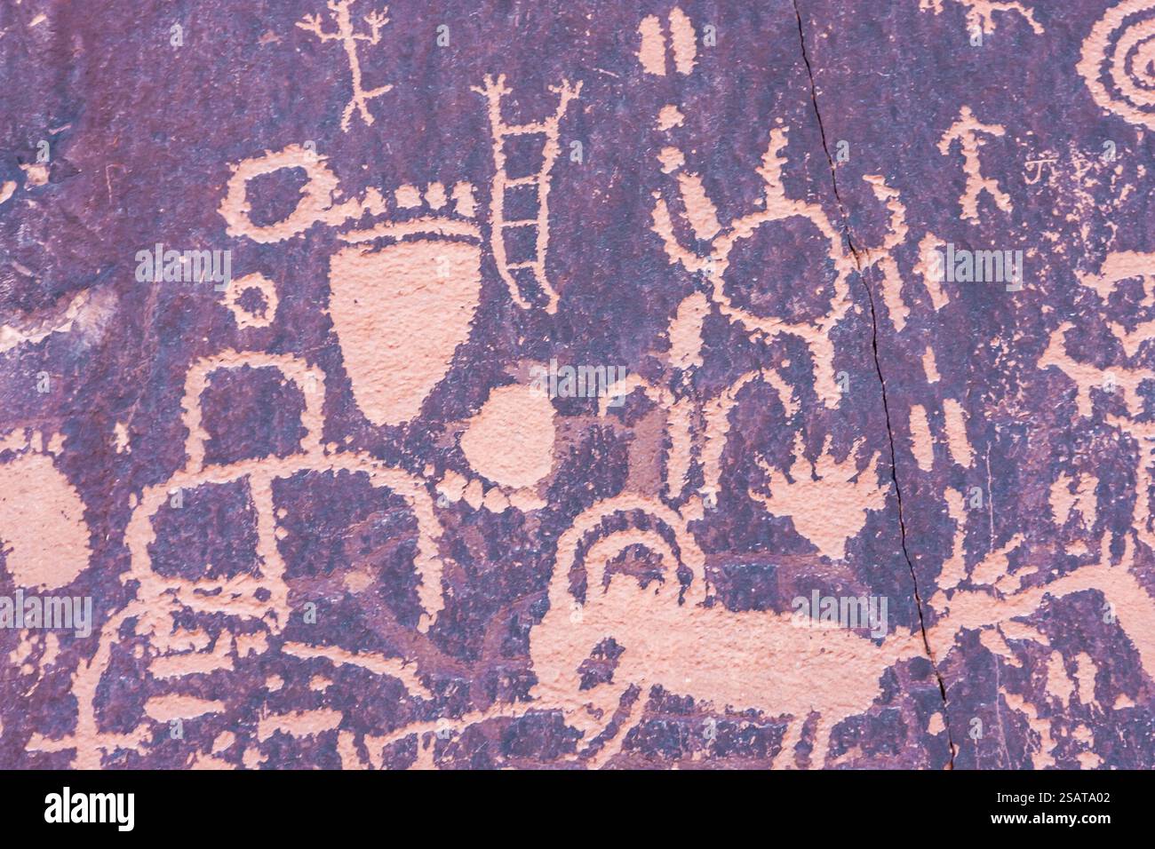 Newspaper Rock State Historic Monument features a flat rock with one of ...