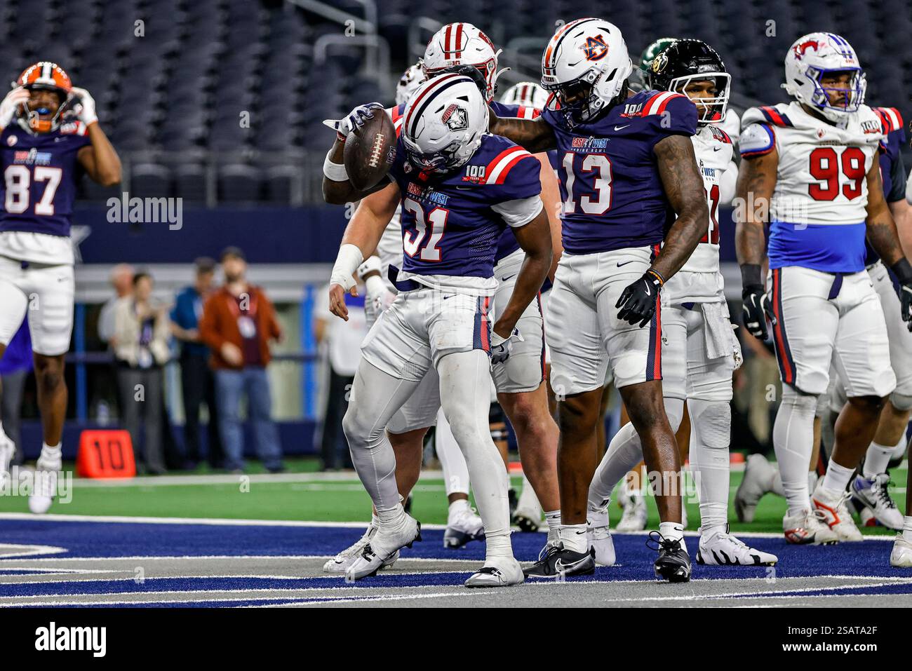ARLINGTON, TX - JANUARY 30: East's Jacory Croskey-Merritt (31) of Arizona scores a touchdown ...