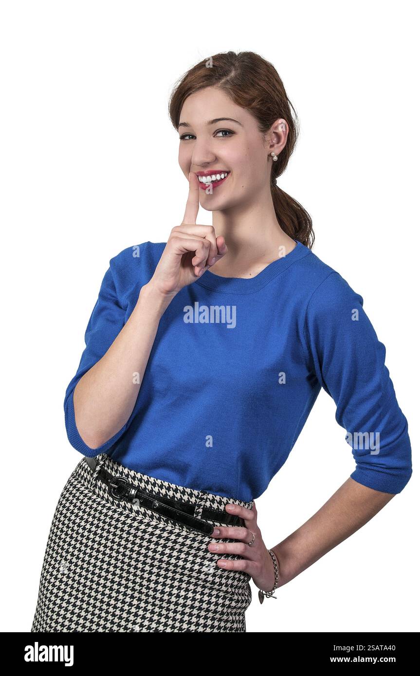 A woman saying be quiet by saying shhh Stock Photo - Alamy