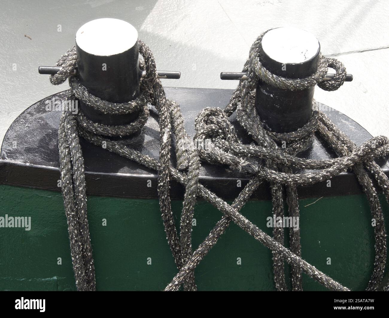 A rope knot is seen in detail on the deck of a boat, carolinensiel ...