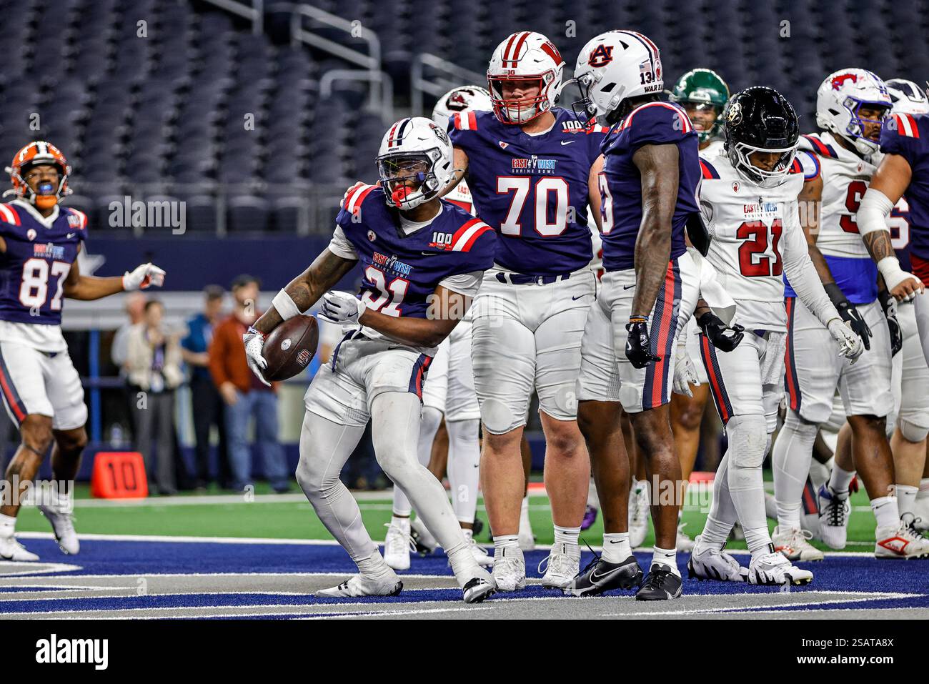 ARLINGTON, TX - JANUARY 30: East's Jacory Croskey-Merritt (31) of Arizona scores a touchdown ...